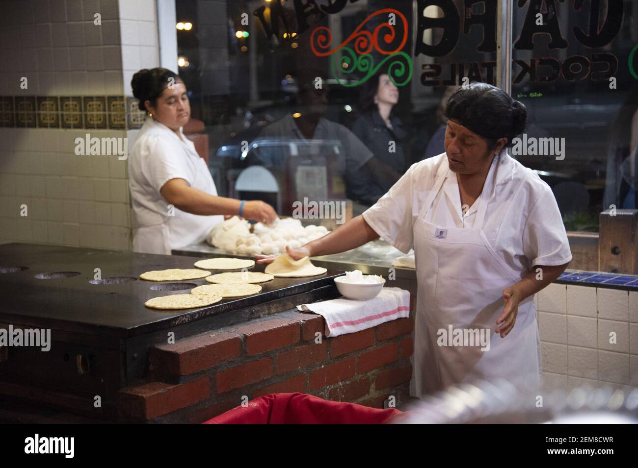 Women make hand made tortillas at the Old Town Mexican Cafe, Old Town ...