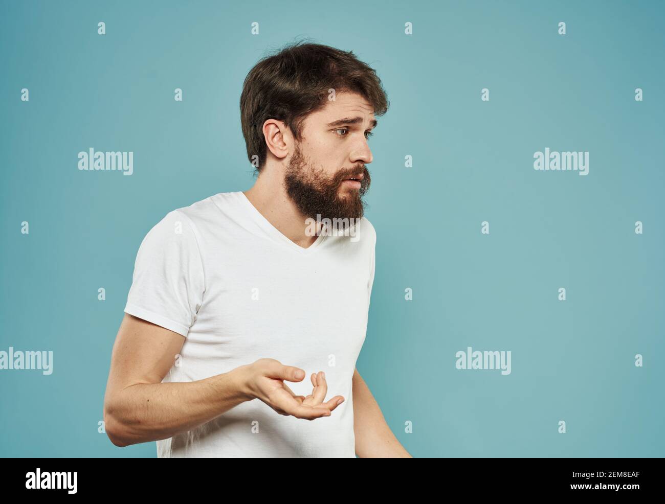 Man indignant look portrait emotions blue background model Stock Photo ...
