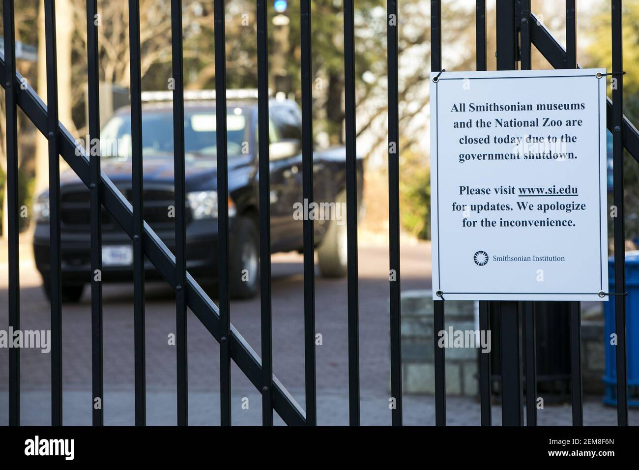 A sign outside of the Smithsonian National Zoological Park informing ...