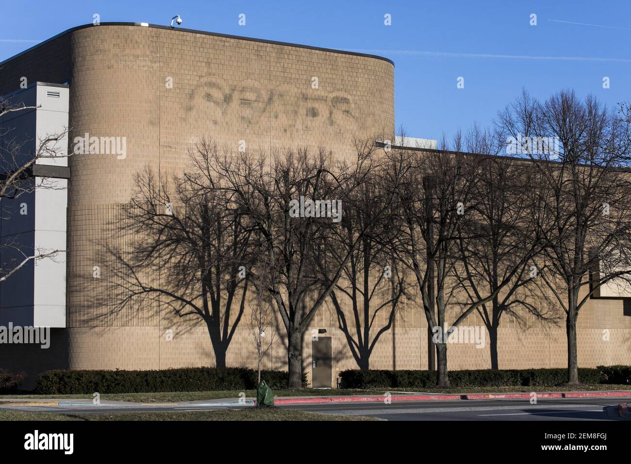 The outline of a Sears logo sign outside of a closed retail store ...