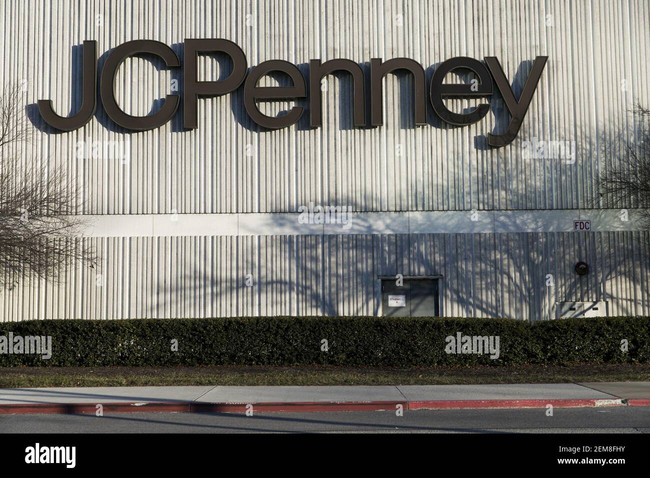 A logo sign outside of a JCPenny retail store in Columbia, Maryland on ...