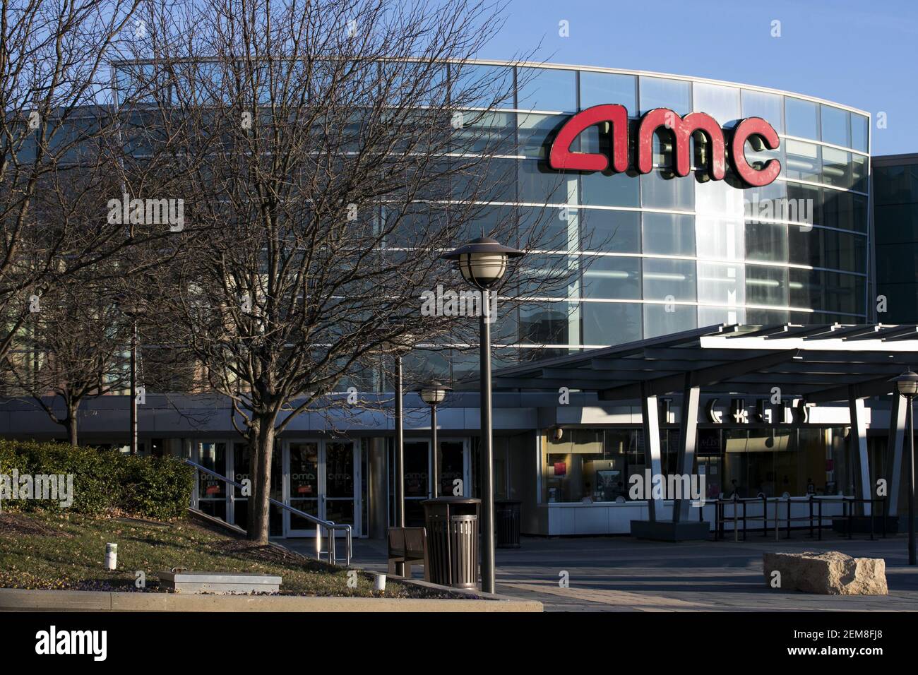 A logo sign outside of a AMC Theatres movie theater in Columbia ...