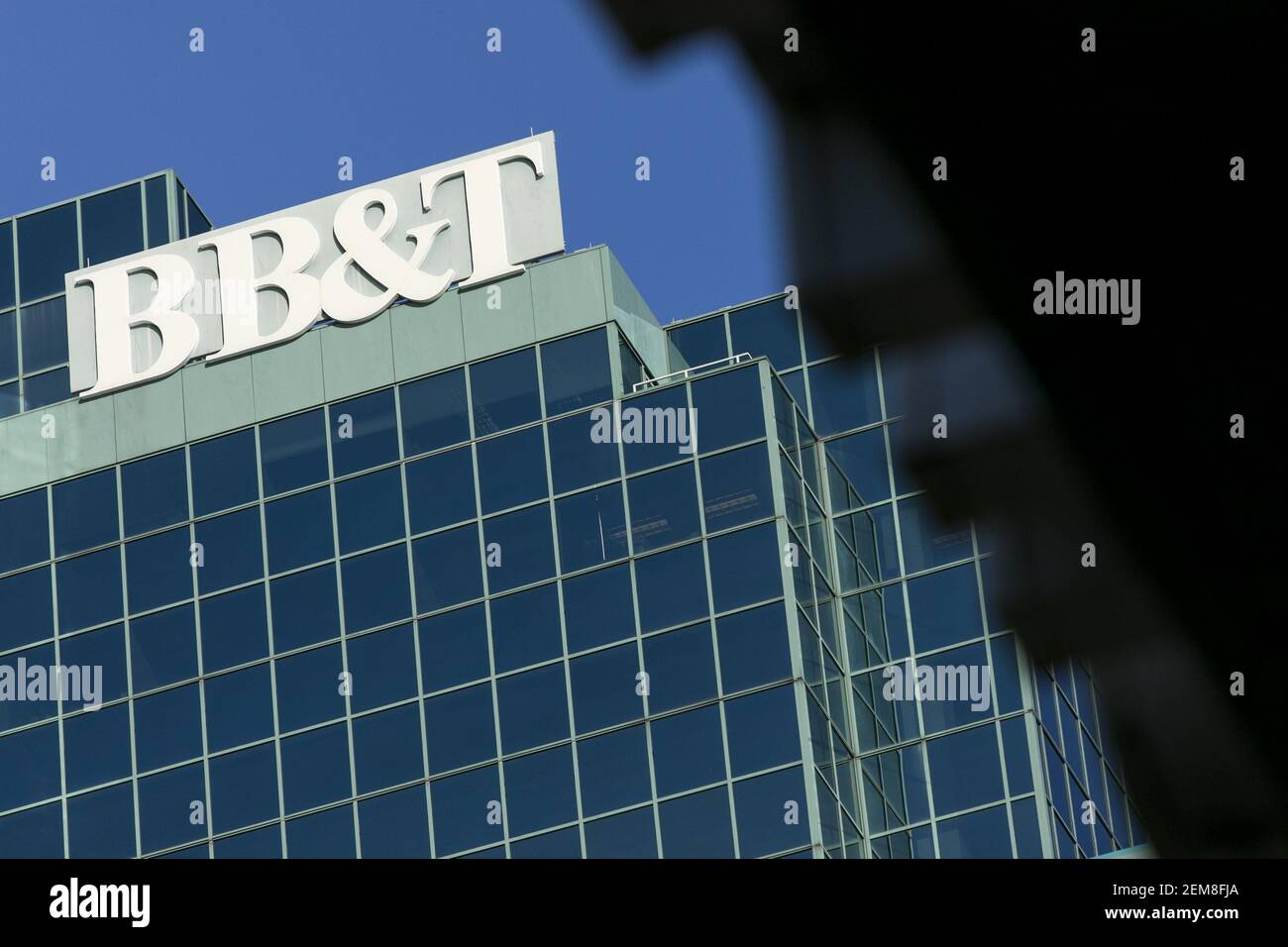 A logo sign outside of a facility occupied by BB&T Bank in Baltimore ...