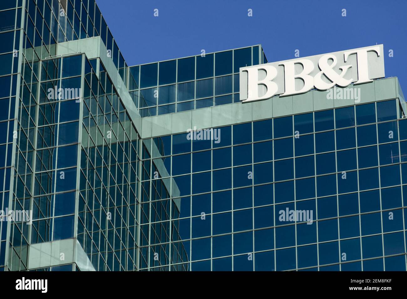 A logo sign outside of a facility occupied by BB&T Bank in Baltimore ...