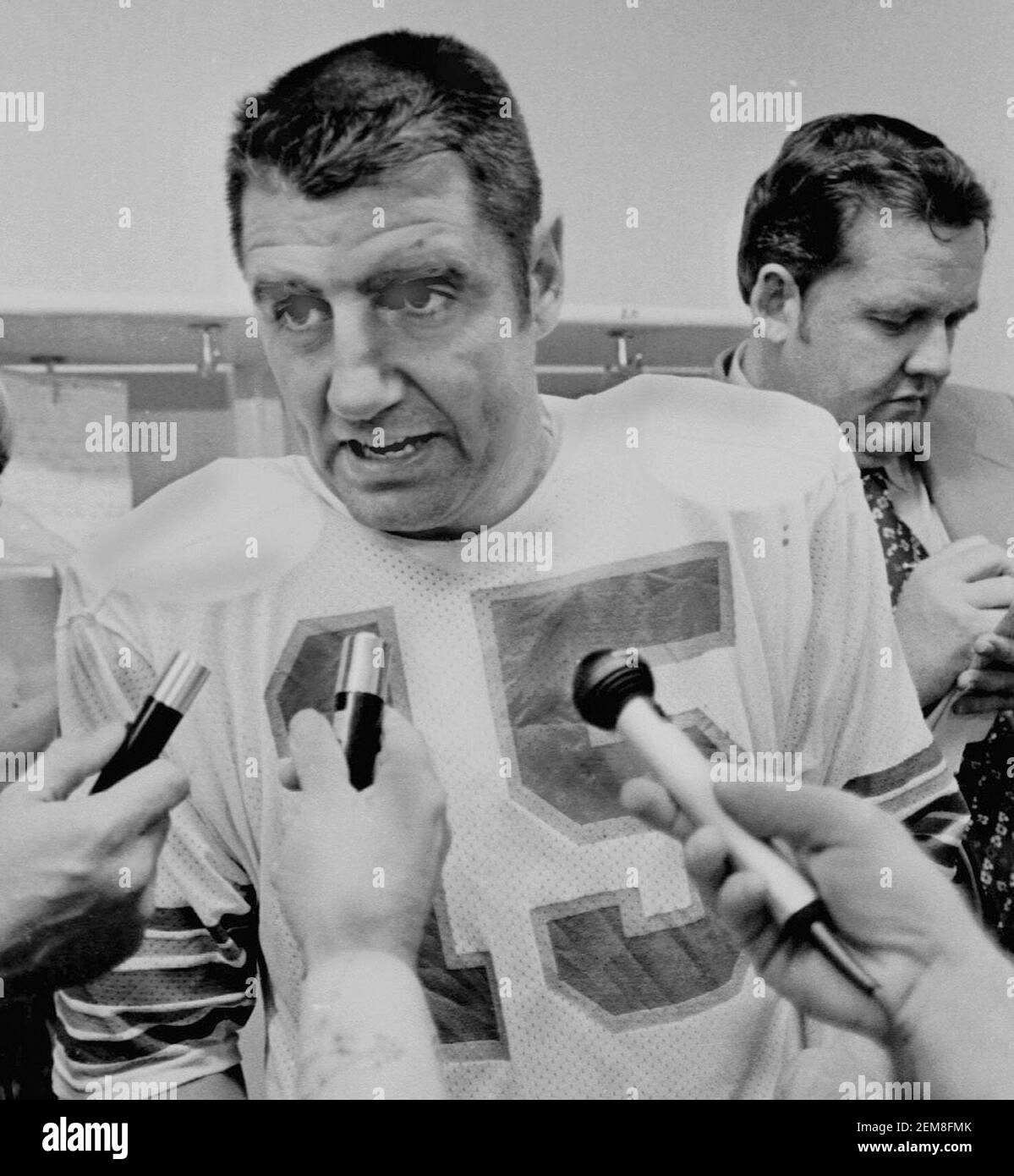 Earl Morrall speaks with the media in 1972 at the Orange Bowl in Miami ...