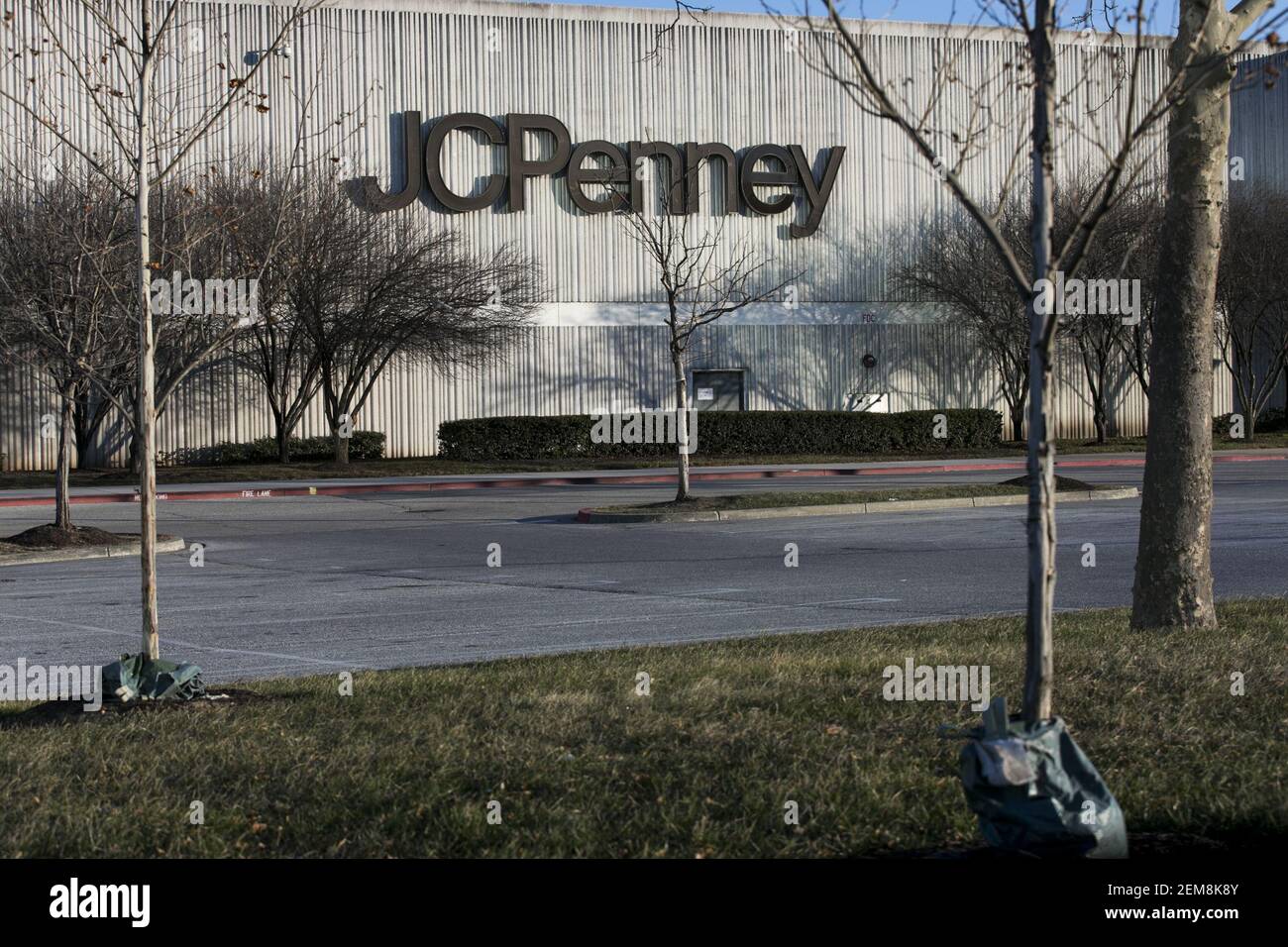 A logo sign outside of a JCPenney retail store in Columbia, Maryland on ...