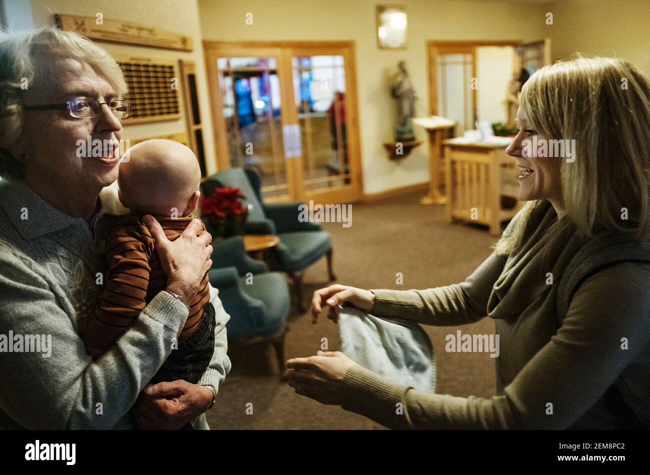 At the St. Peter Parish in Cameron, Wis. Margaret Failor hands back to ...