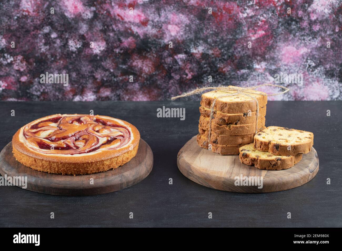 Strawberry pie and sultana pie slices on wooden boards Stock Photo - Alamy
