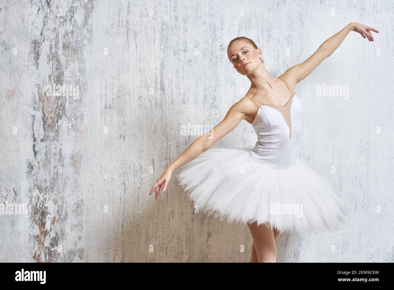 Legs ballerina pointe shoes white tutu performance Stock Photo - Alamy