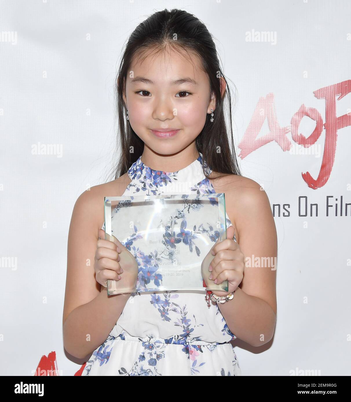 Actress Megan Liu with the award for Best Fantasy/Sci Fi for her short ...