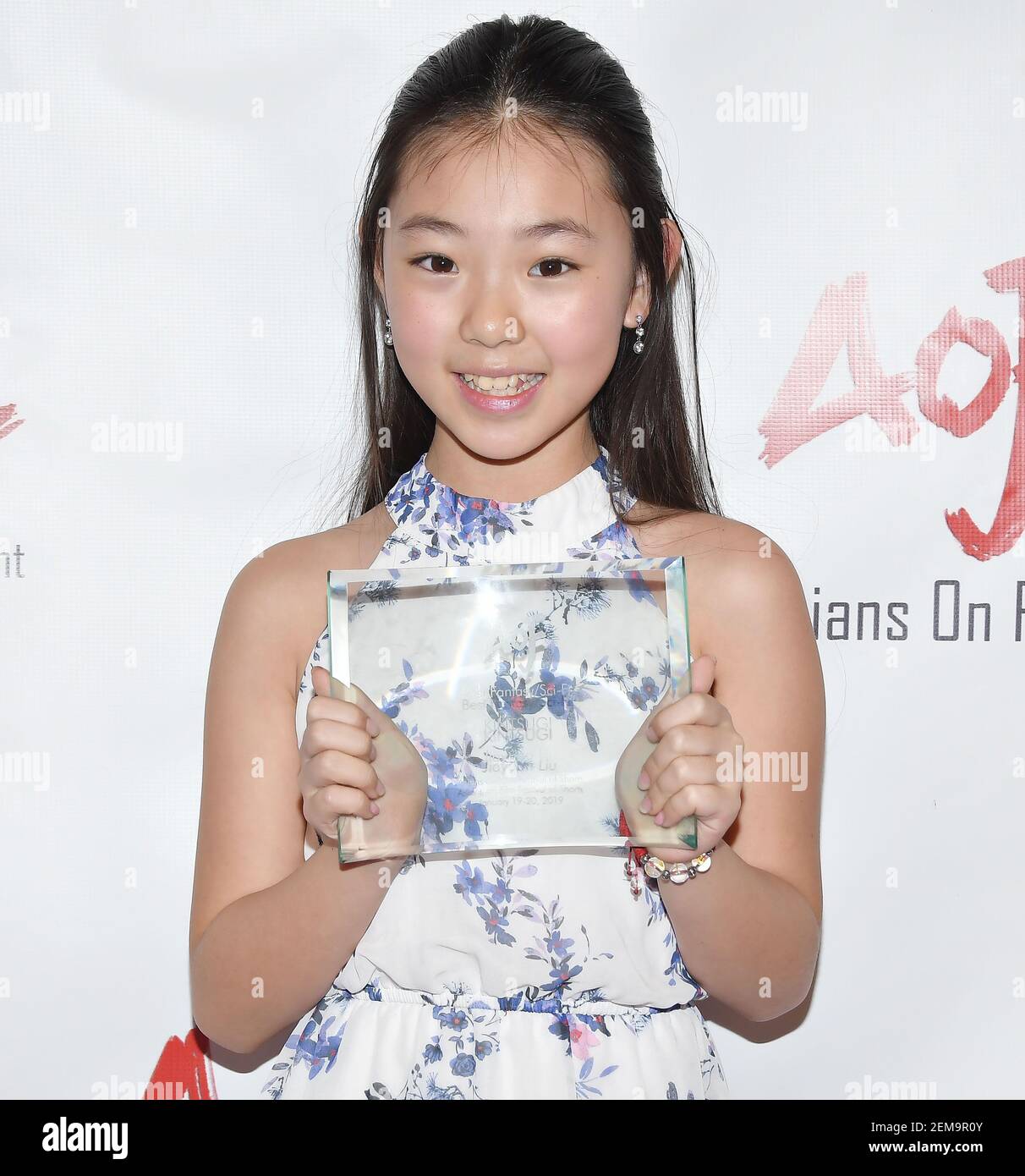 Actress Megan Liu with the award for Best Fantasy/Sci Fi for her short ...