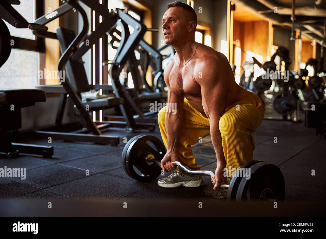 Dedicated individual lifting heavy barbell hi-res stock photography and ...