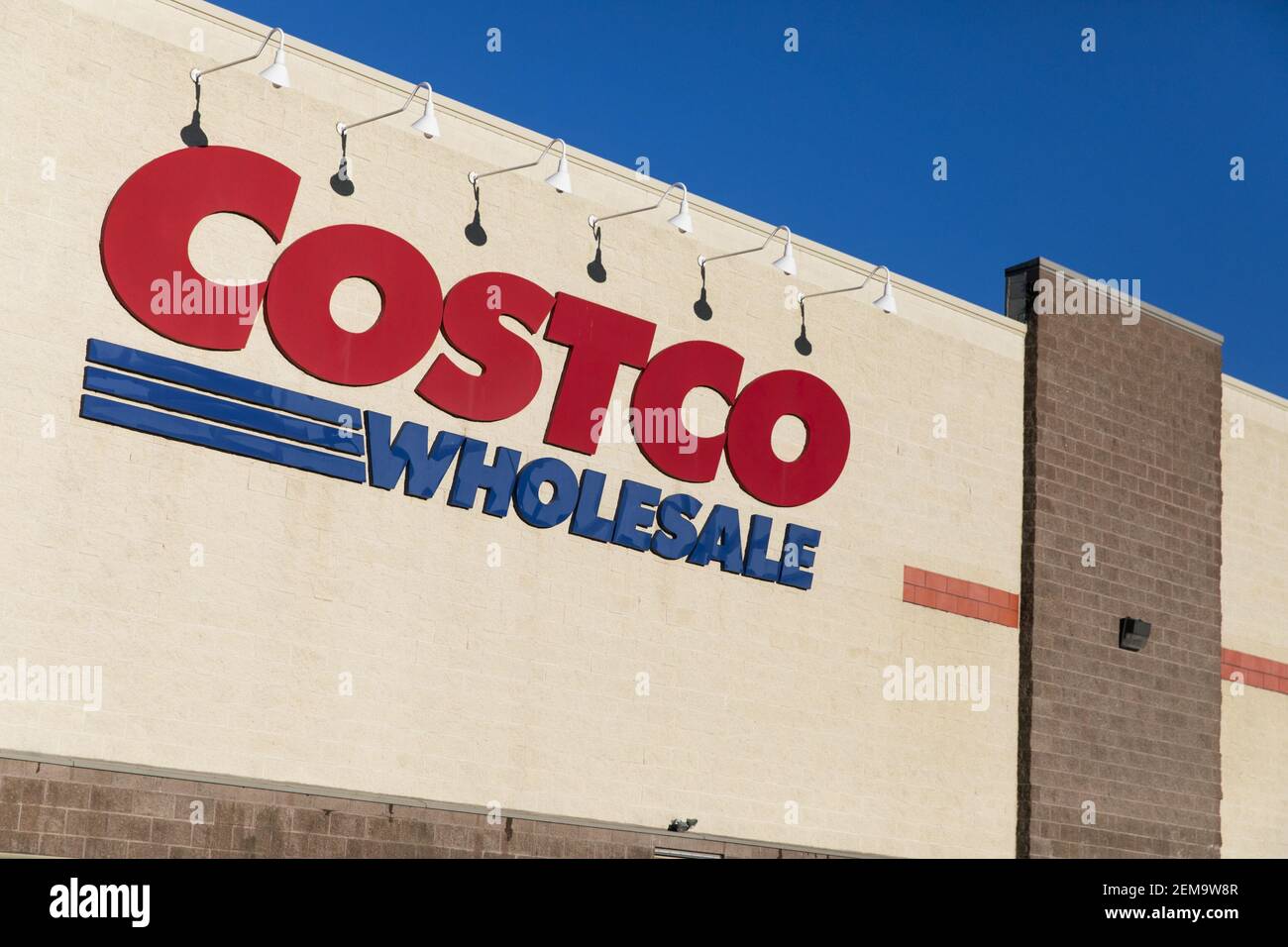 A logo sign outside of a Costco Wholesale warehouse store in Woodbridge ...