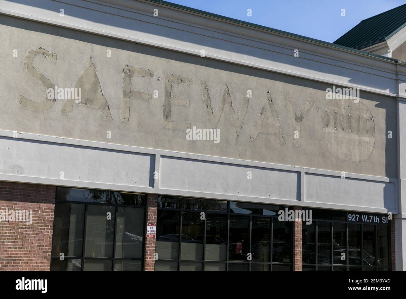 The outline of a logo sign outside of an abandoned Safeway grocery ...