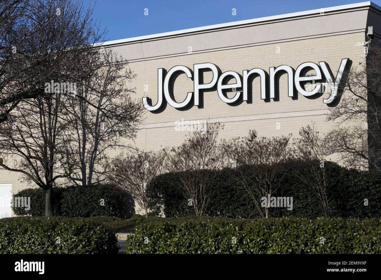 A logo sign outside of a JCPenney retail store location in Frederick ...