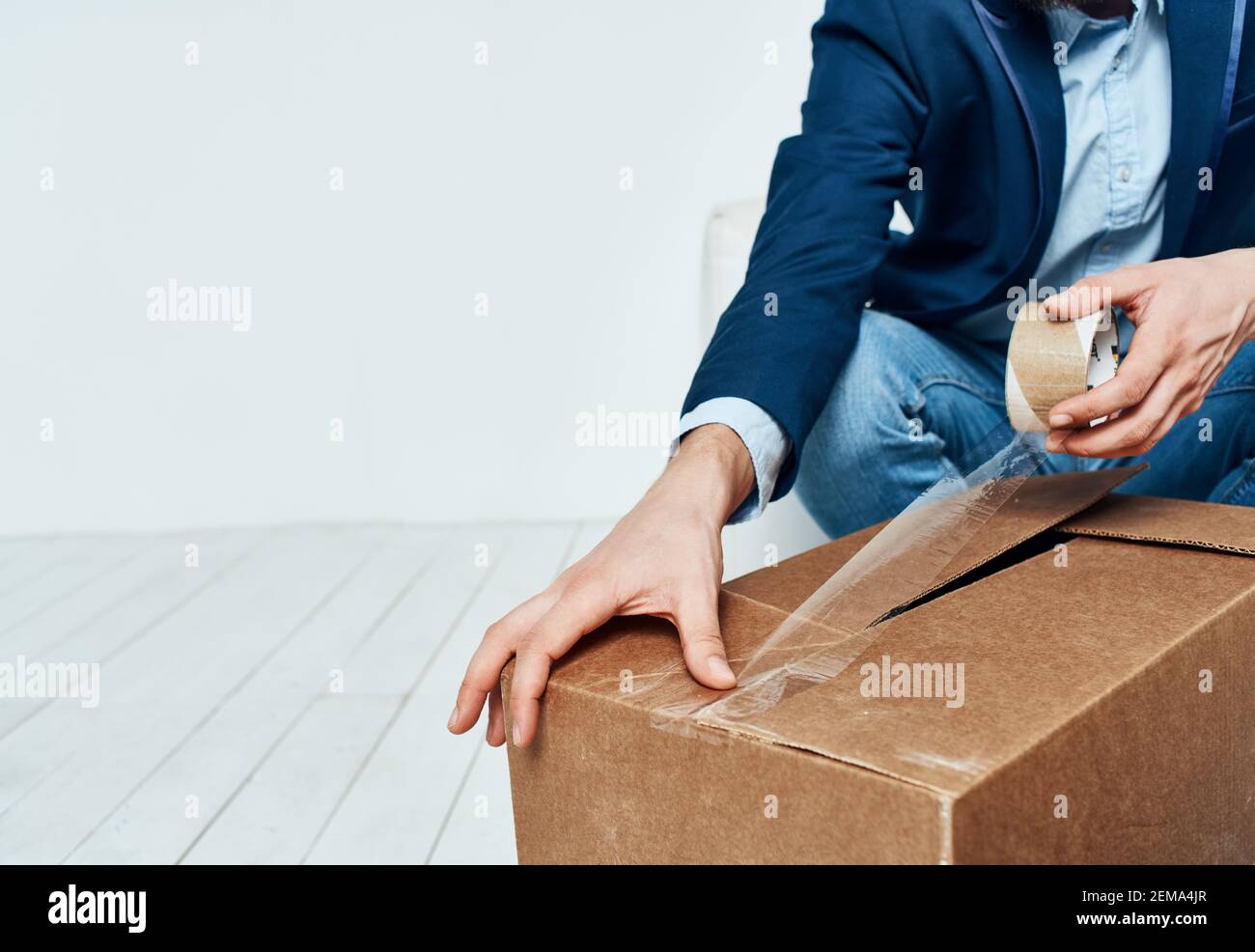 Business man pack in boxes office manager official Stock Photo - Alamy