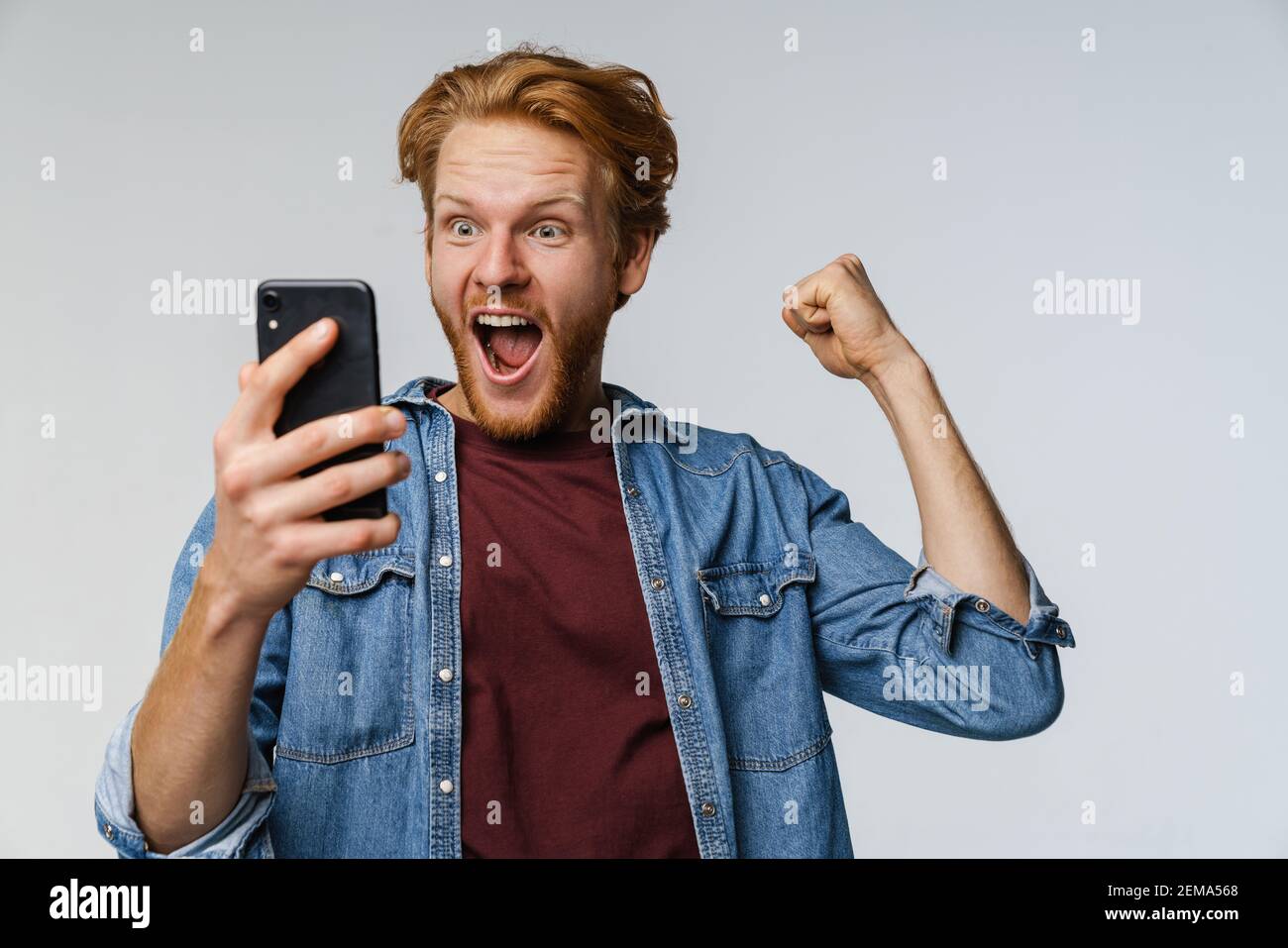 Delighted guy making winner hi-res stock photography and images - Alamy