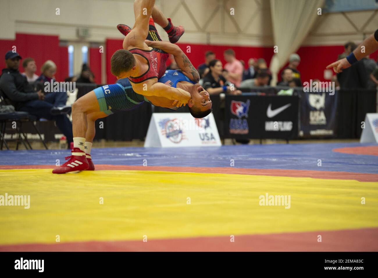Anthonie Linares(Blue), throws Reynolds(Red) in the Greco Roman Prelims ...