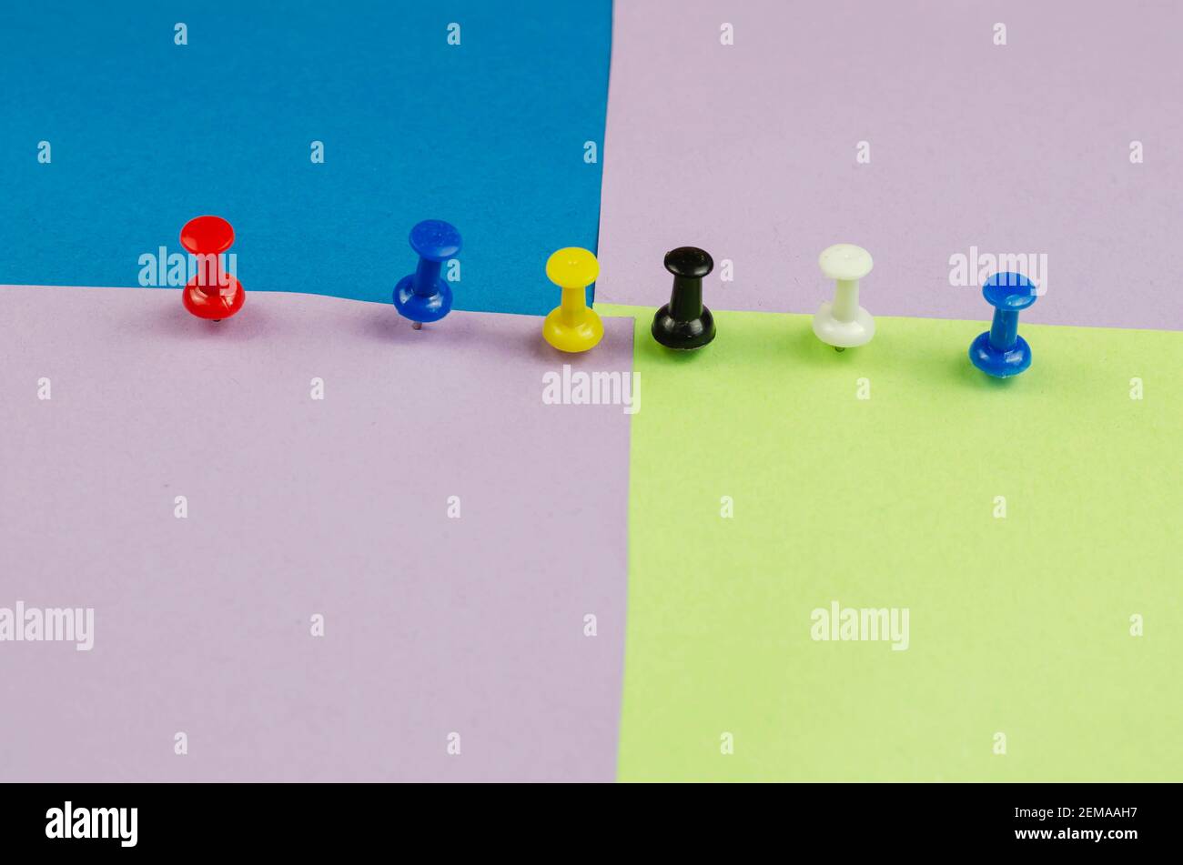 Push pins and lots of colorful sticky notes. Red, blue, yellow, black ...