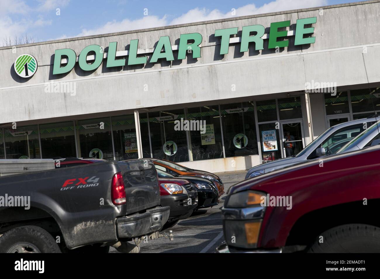 A logo sign outside of a Dollar Tree retail store location in ...