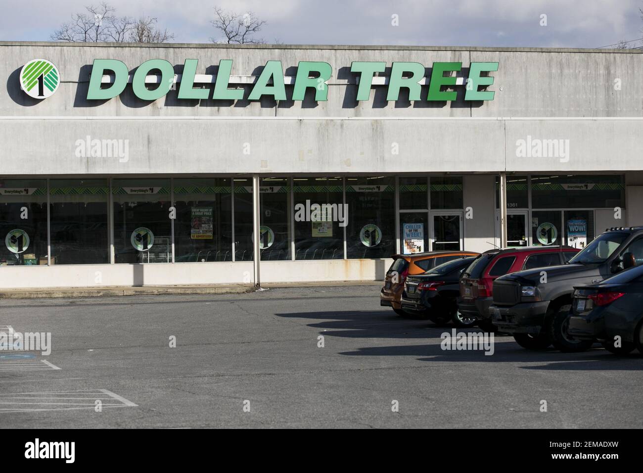 A logo sign outside of a Dollar Tree retail store location in ...