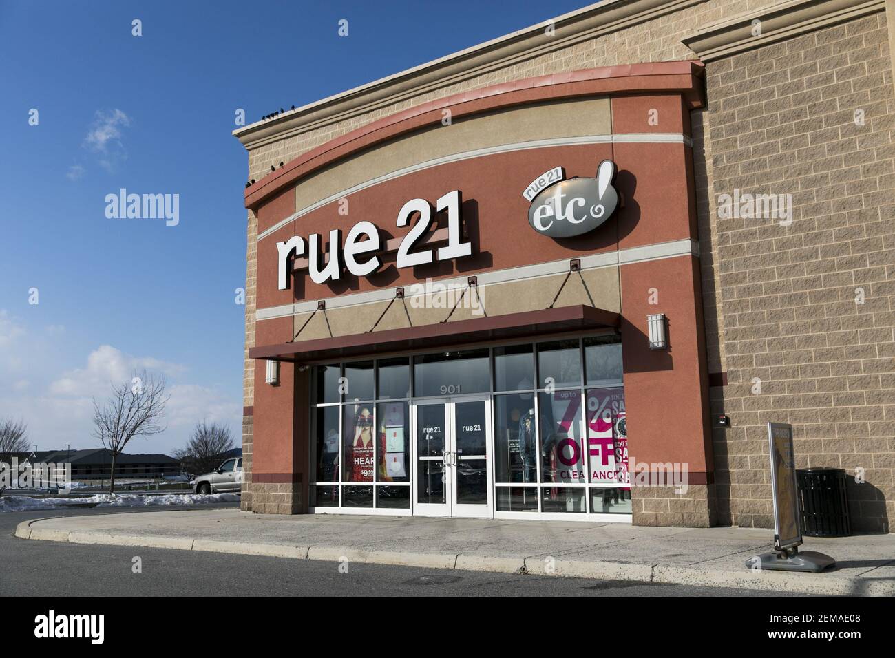 A logo sign outside of a rue21 retail store location in Chambersburg ...