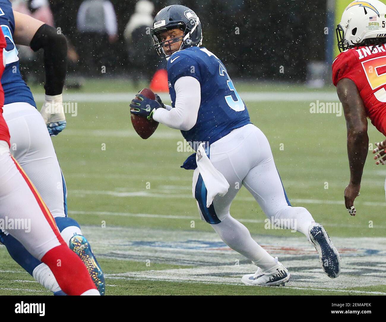 NFC quarterback Russell Wilson (3) scrambles during the NFL Pro Bowl at ...