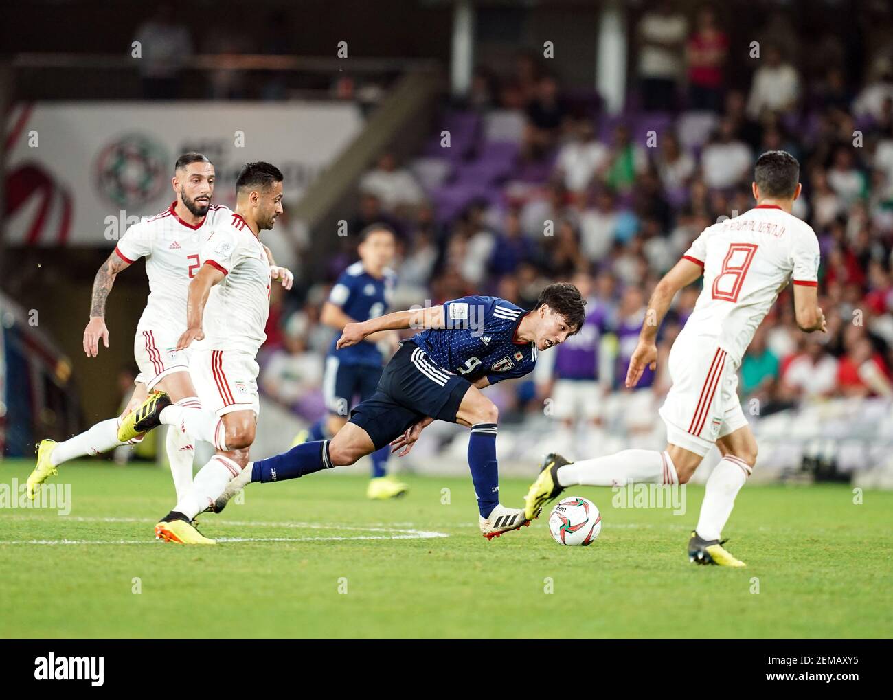 January 28, 2019 : Omid Ebrahimi of Iran fouling Takumi Minamino of ...
