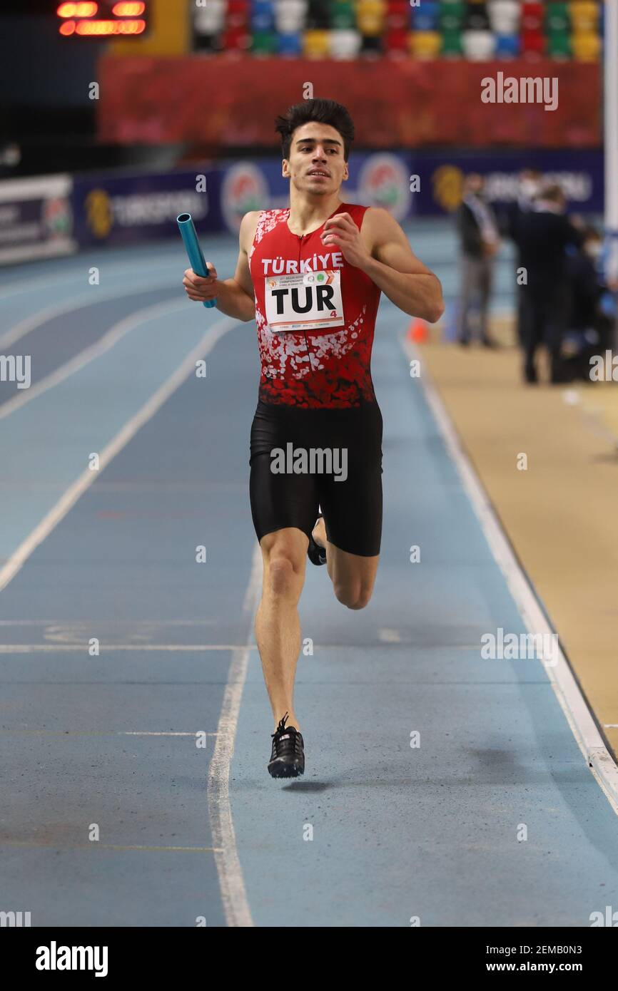 ISTANBUL, TURKEY - FEBRUARY 20, 2021: Undefined athlete running 4x400 ...