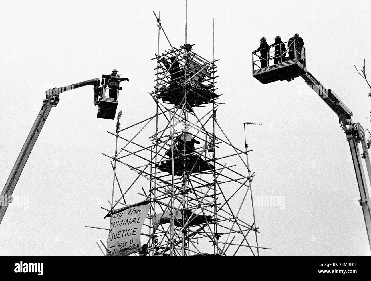 Bailiffs in cherry pickers attempt to evict protesters from a large ...