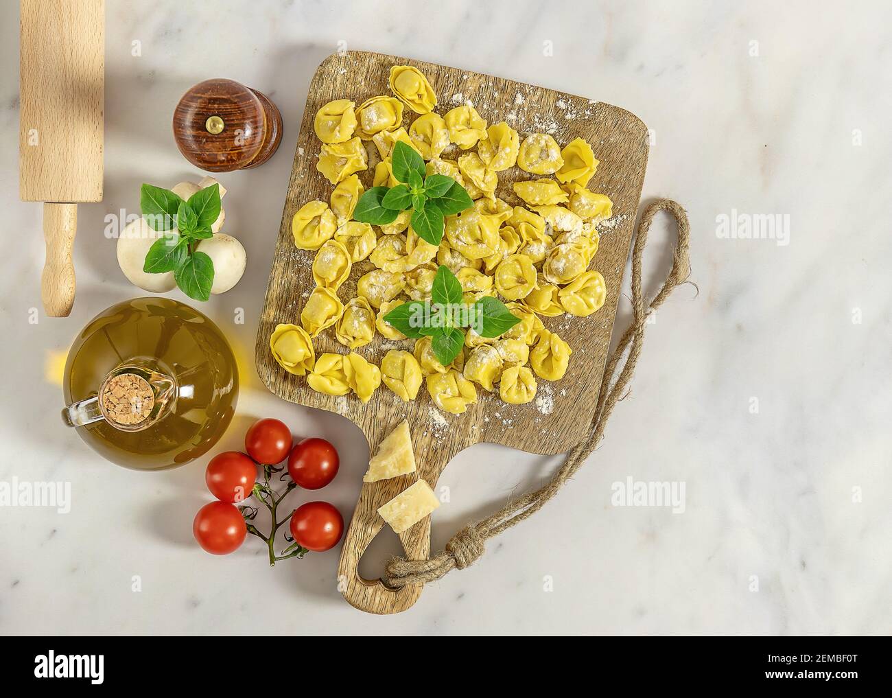 Homemade raw Italian stuffed pasta tortellini Stock Photo - Alamy