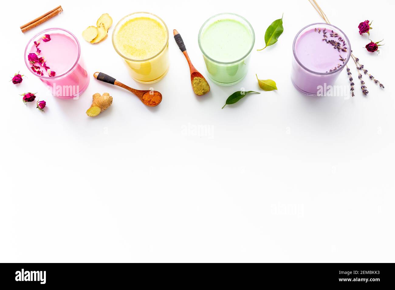 Green, yellow and pink latte. Hot colorful coffee or tea with milk ...
