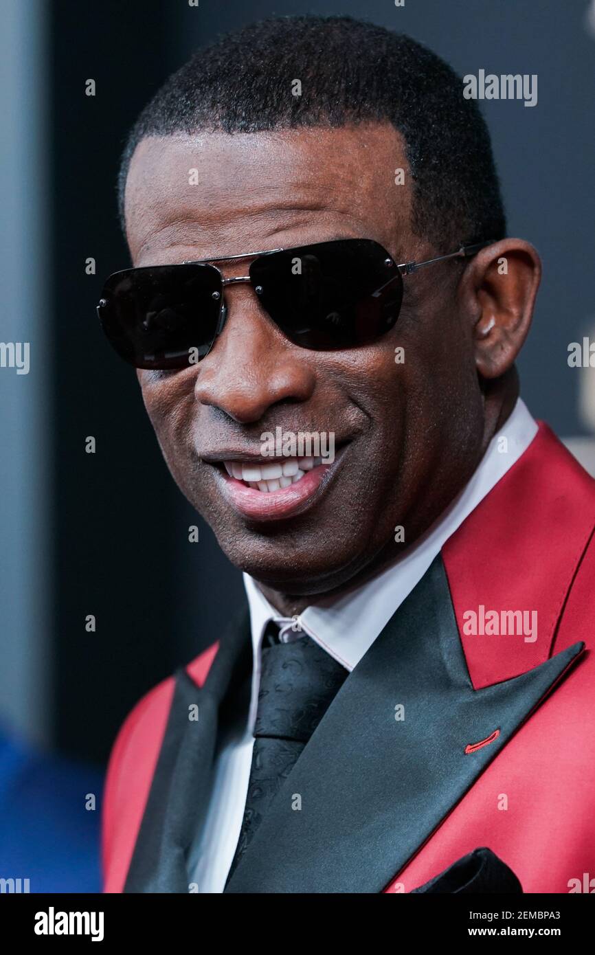 Deon Sanders walking the red carpet at the NFL Honors event held at the ...