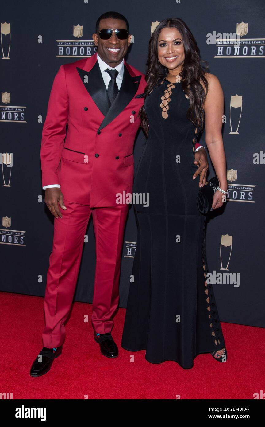 Deion Sanders and Tracey Edmonds walking the red carpet at the NFL ...