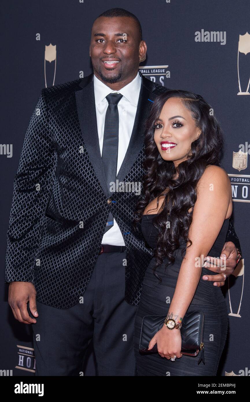 Corey Liuget and Faven Liuget walking the red carpet at the NFL Honors ...