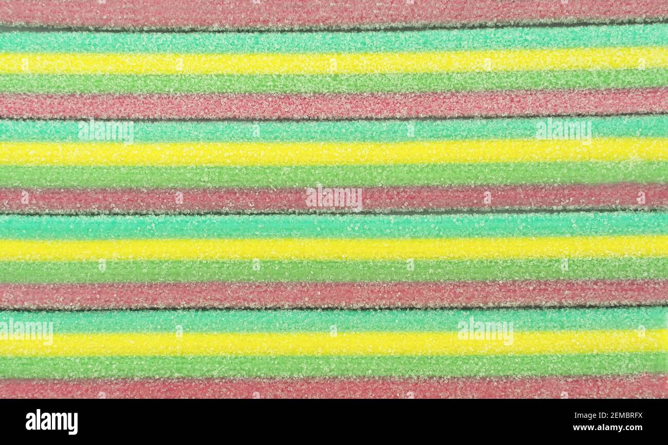 Marmalade stripes. Colorful rainbow background. Sugar gummy surface ...