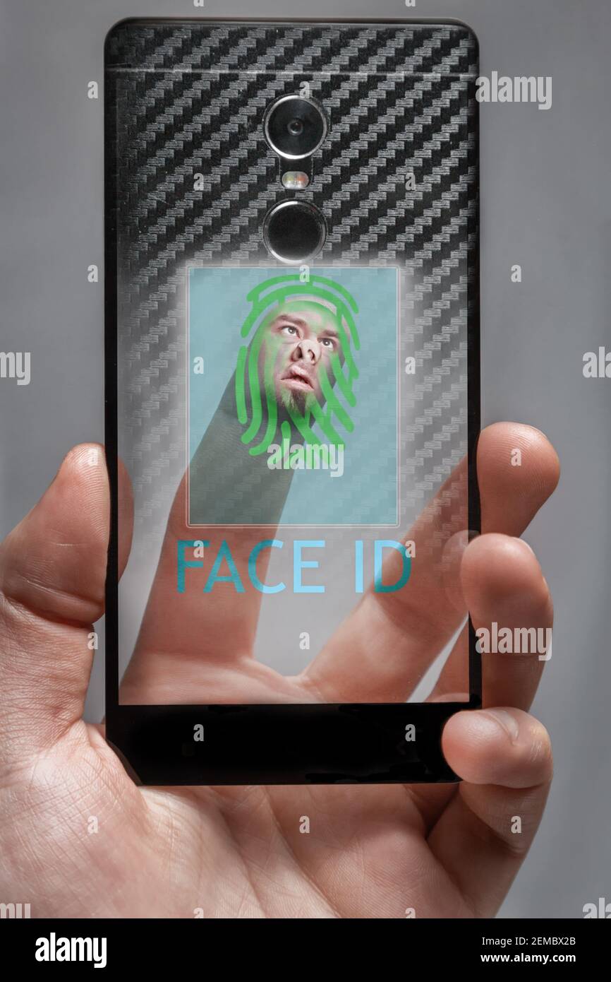 the concept of Face ID . the face on the finger touches the sensor ...