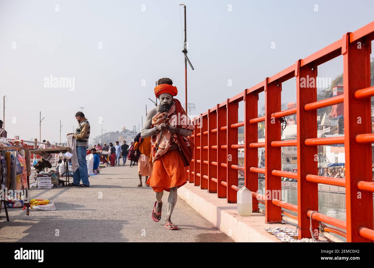 Indian Sadhu in traditional saffron dress participating in Kumbh ...