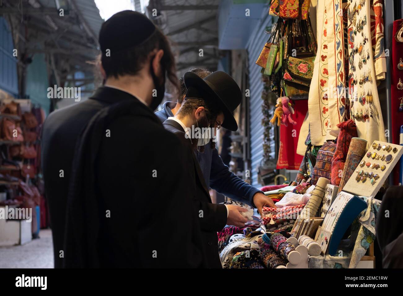Ultra-Orthodox Jews wearing face mask due to the Covid-19 pandemic shop ...