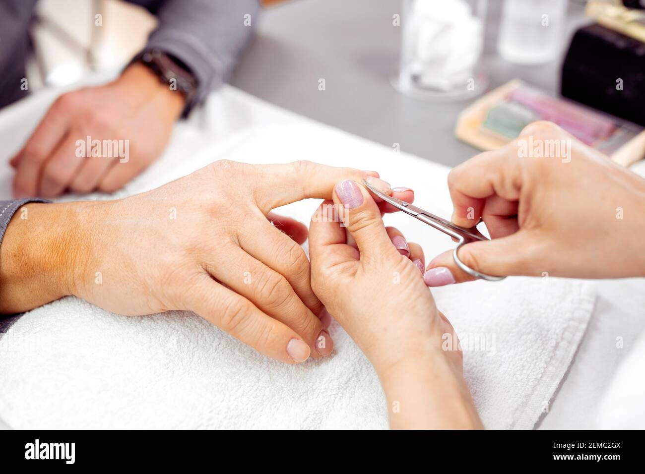 Manicure for men, cutting of sidewall hangnail, neat nail concept Stock ...