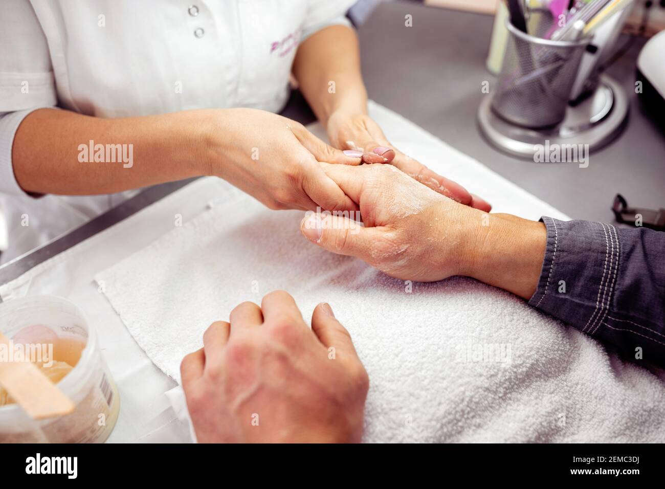 Hand finger massage oil close hi-res stock photography and images - Alamy