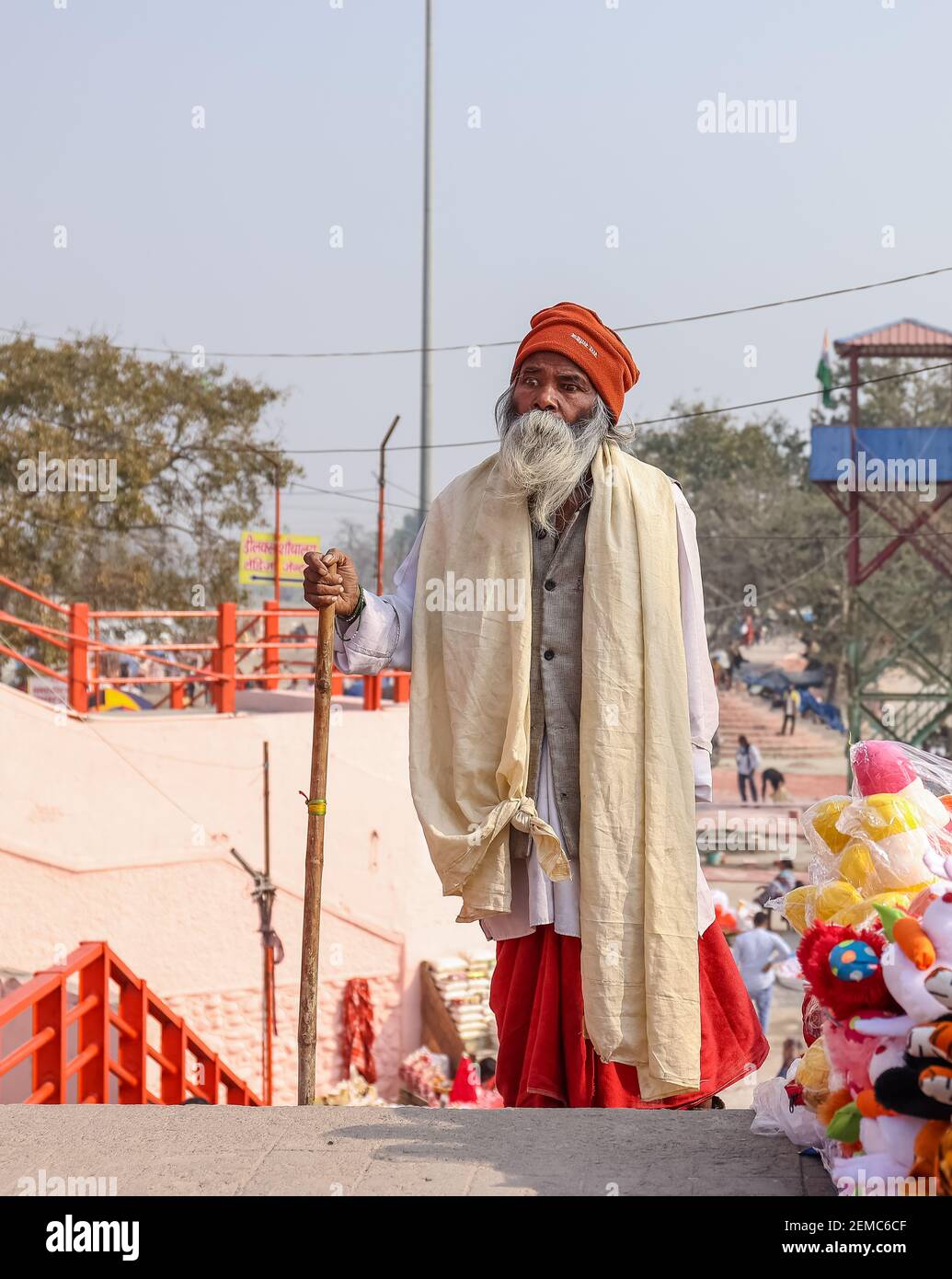 Indian Sadhu in traditional saffron dress participating in Kumbh ...