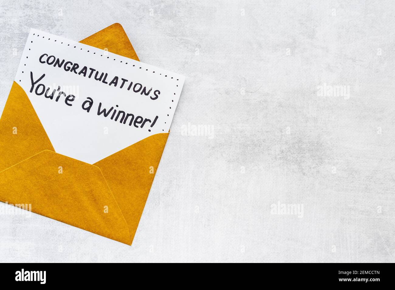 Congratulations award concept -You are a winner card in golden envelope ...