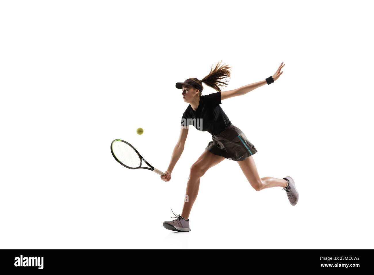 Competitive. Young caucasian professional sportswoman playing tennis on ...