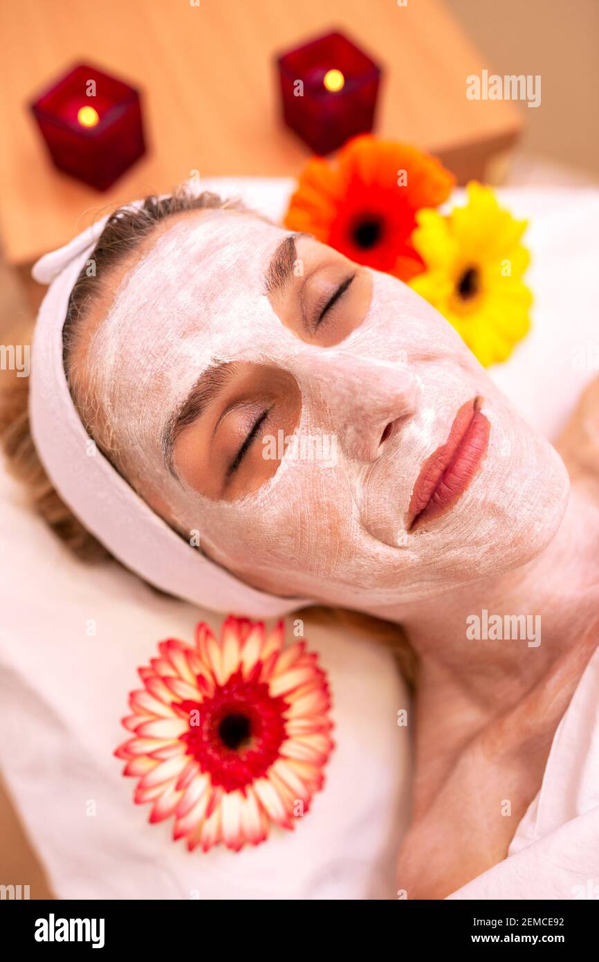 Face mask as part of regular skin care routine applied in beauty salon ...