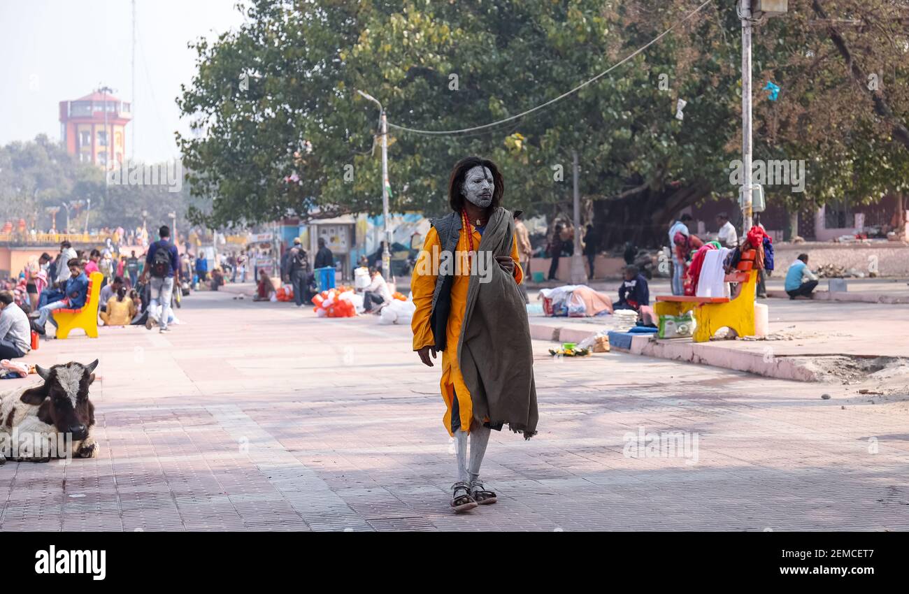 Indian Sadhu in traditional saffron dress participating in Kumbh ...