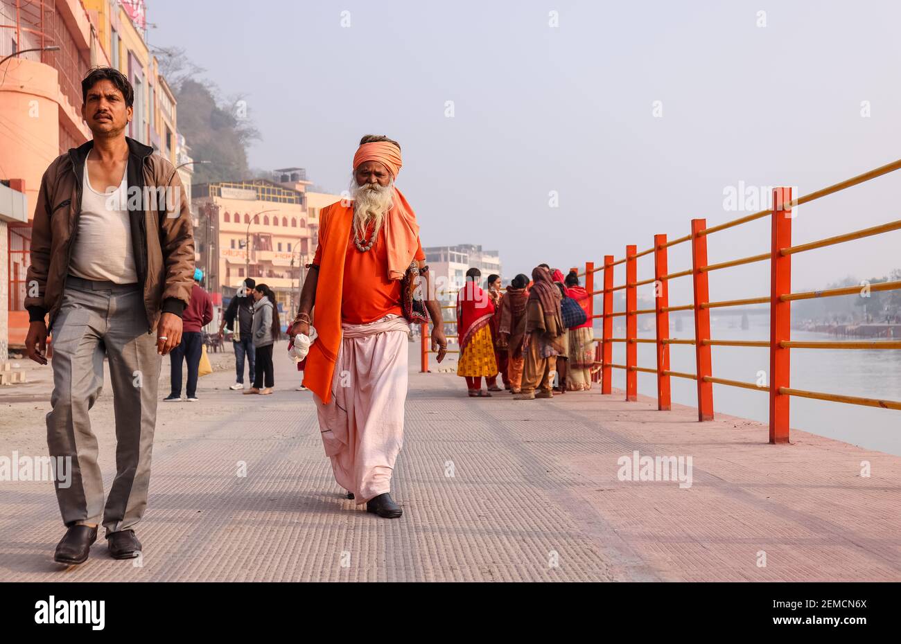 Indian Sadhu in traditional saffron dress participating in Kumbh ...
