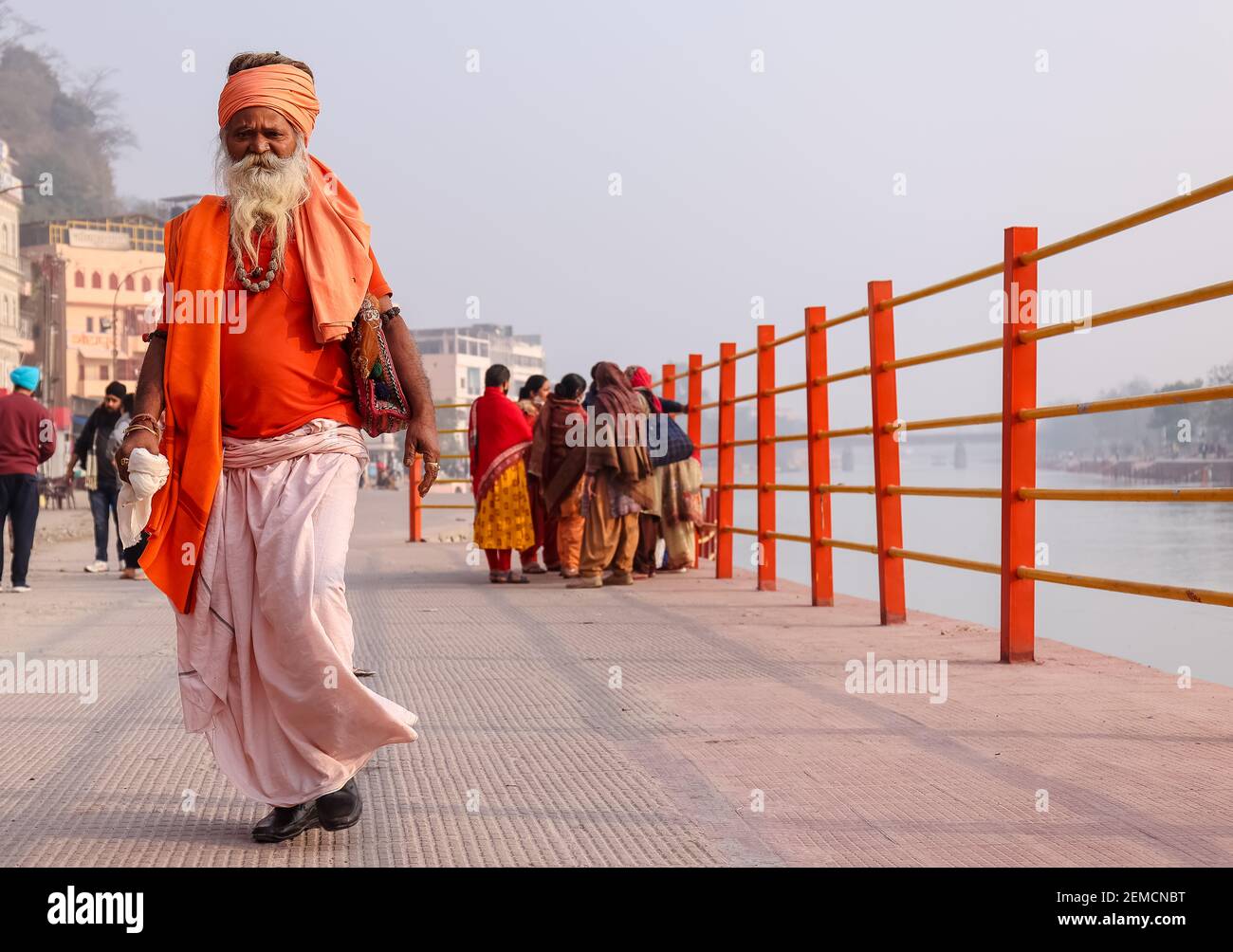 Indian Sadhu in traditional saffron dress participating in Kumbh ...