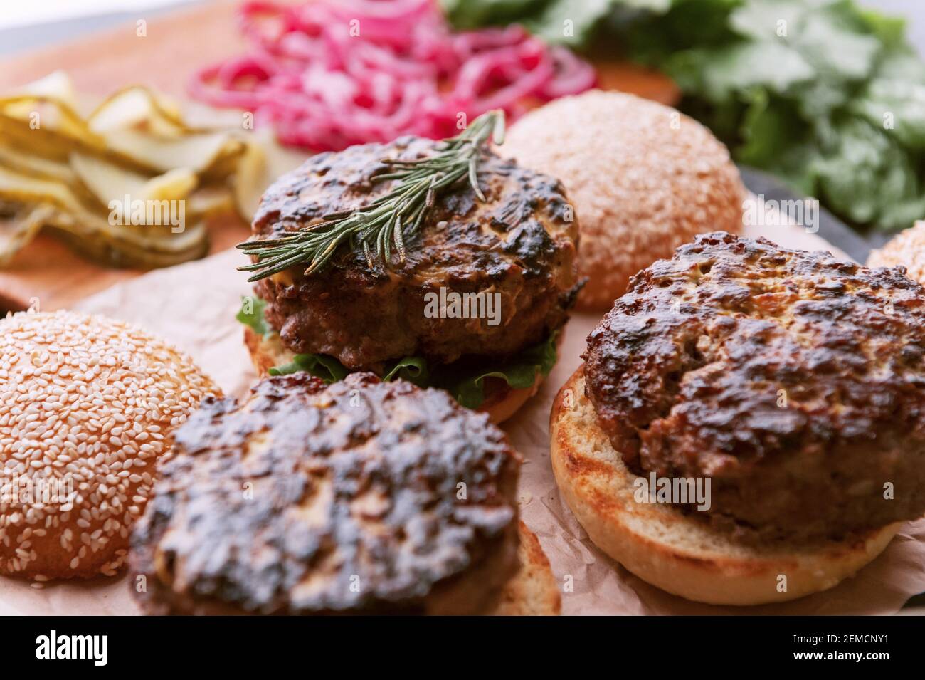 Ingredients for a tasty and juicy burger home in a rustic style with a ...