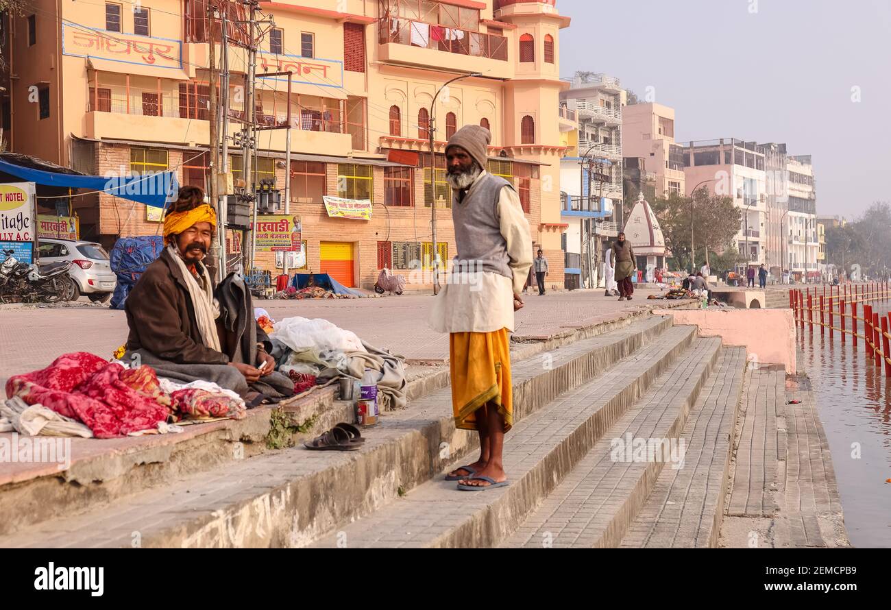 Indian Sadhu in traditional saffron dress participating in Kumbh ...